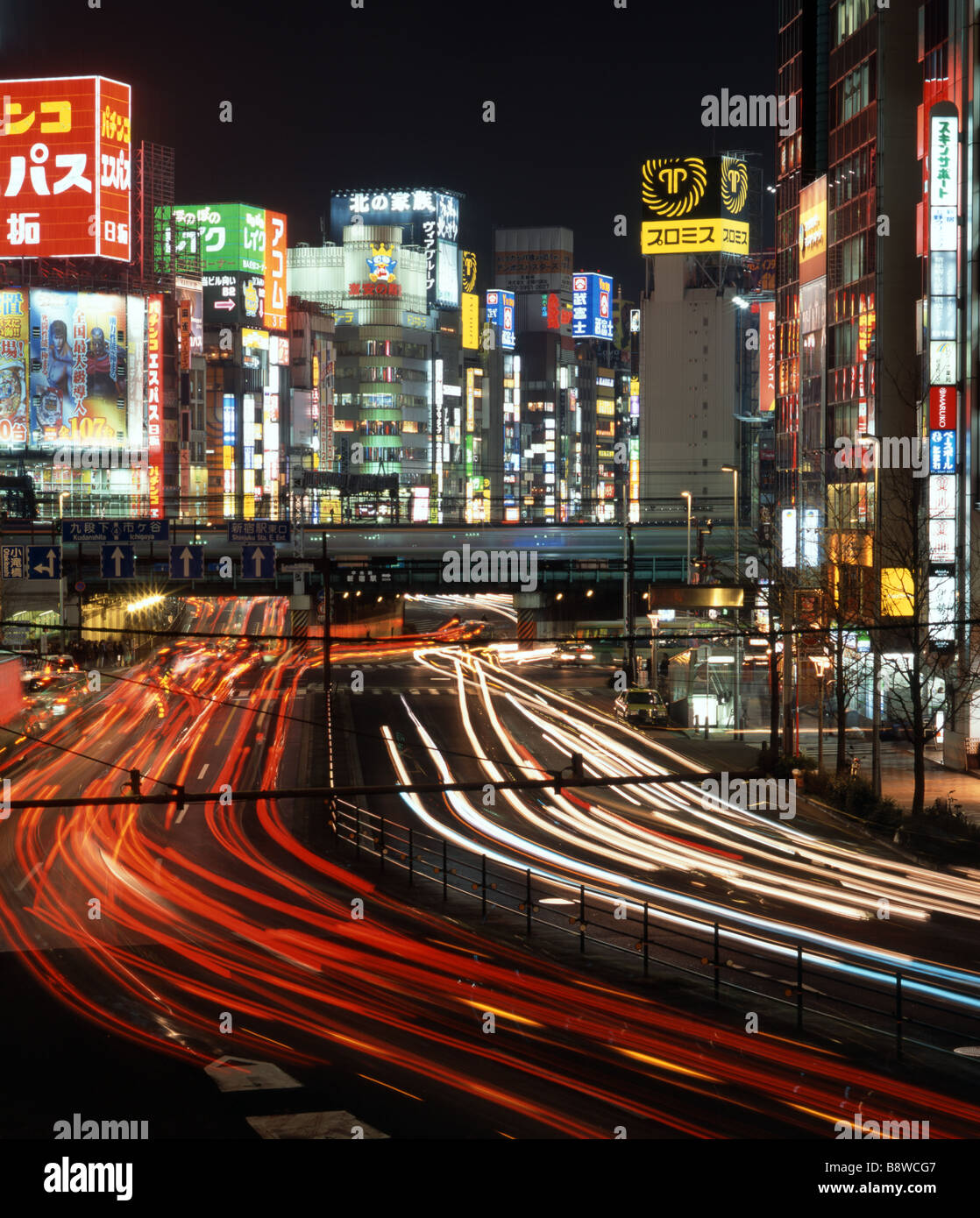 Neon lights and traffic Shinjuku Stock Photo - Alamy