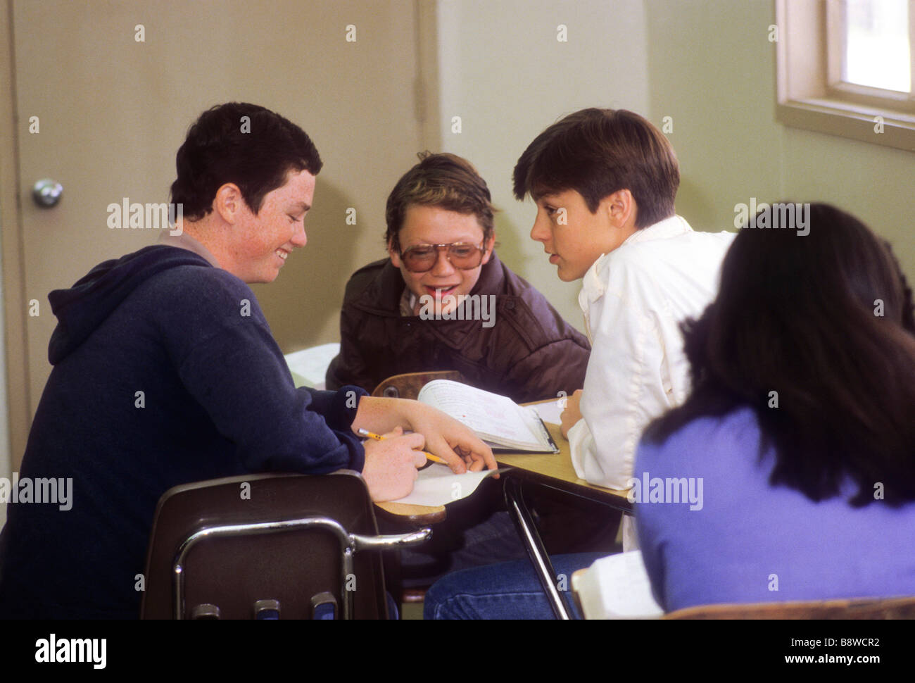 three boy talk in class school learn share together work Stock Photo ...