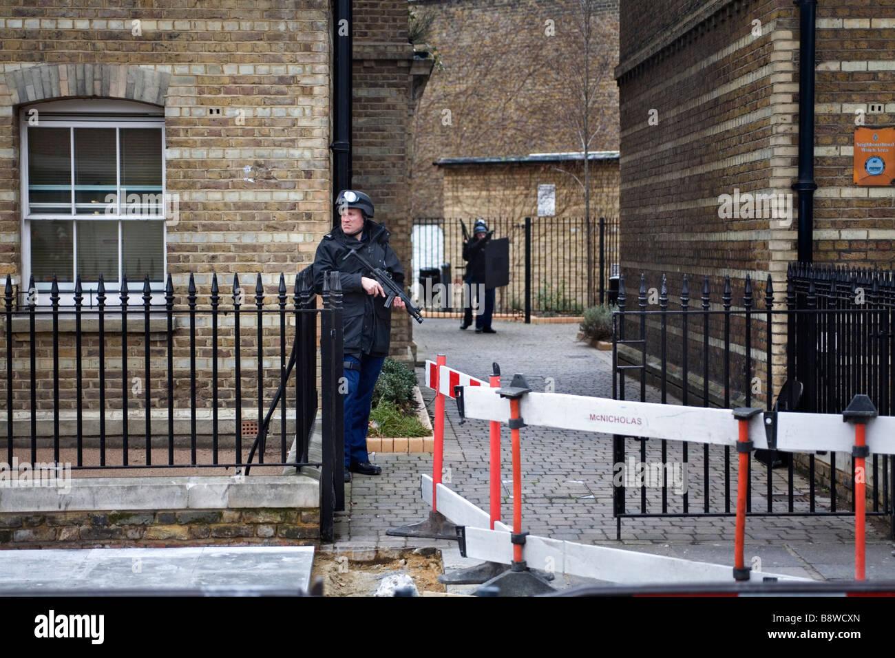 Heavily armed police officer in hi-res stock photography and images - Alamy