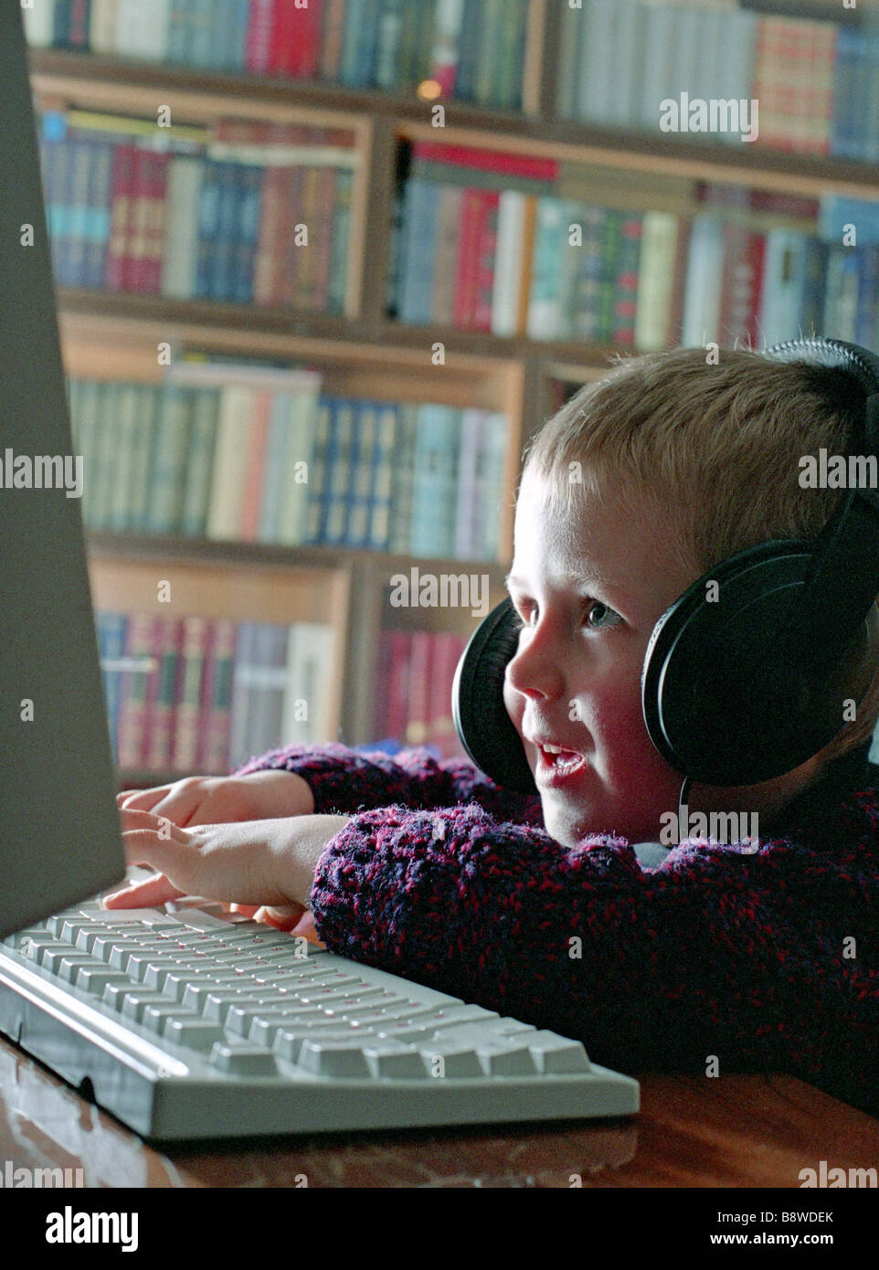 child play on computer at home Stock Photo - Alamy