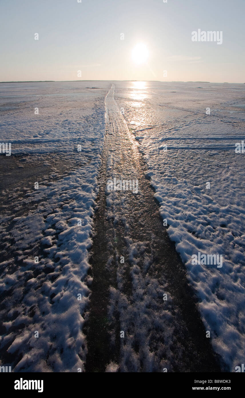 Frozen snowmobile track on sea ice , Finland Stock Photo - Alamy