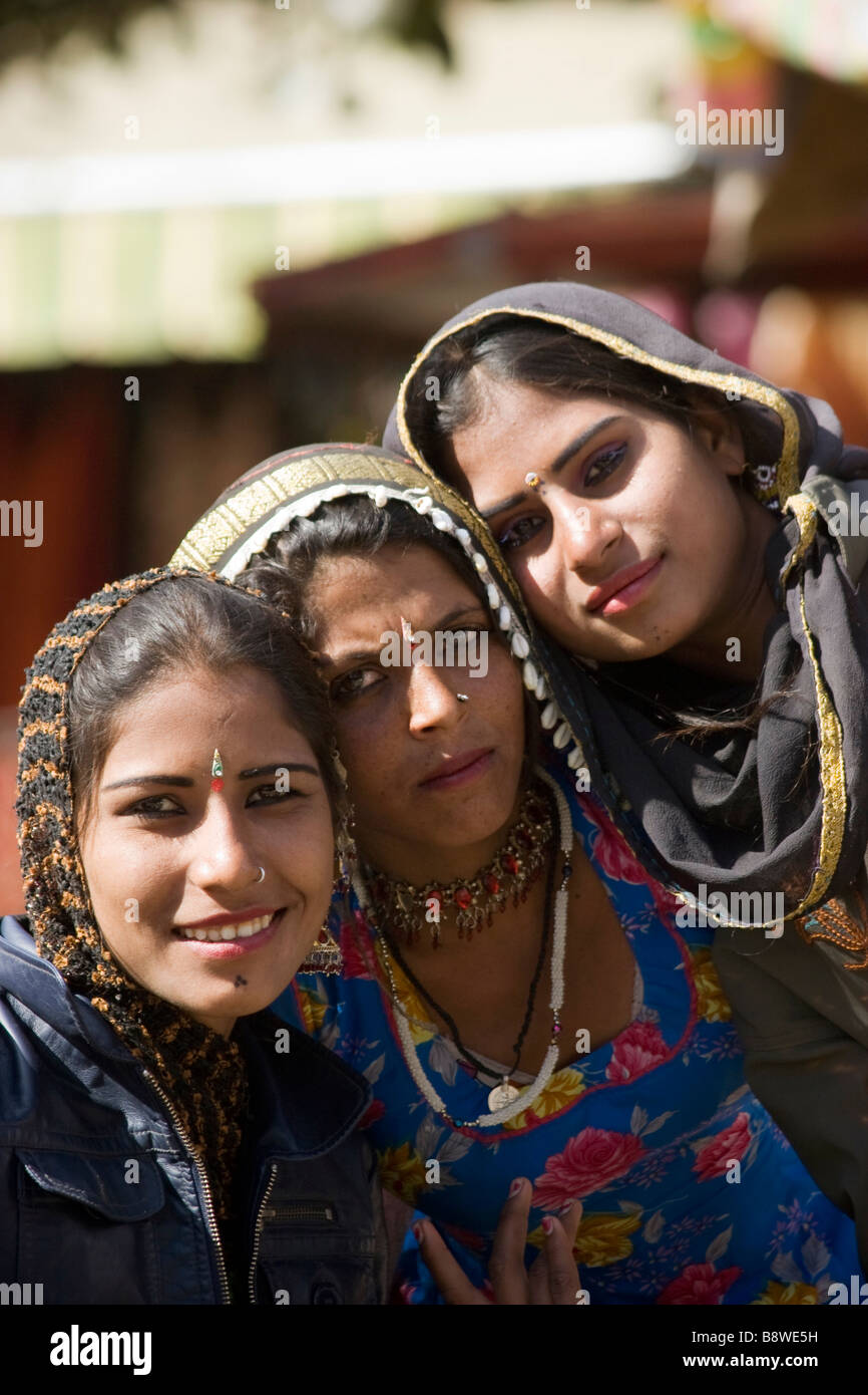 Indian women pose for camera Pushkar Rajasthan India Stock Photo - Alamy