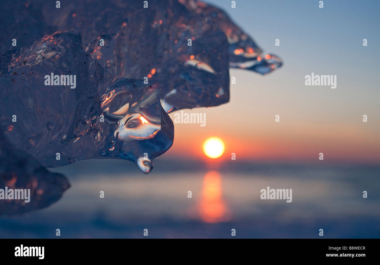 Sun reflecting through ice Stock Photo - Alamy