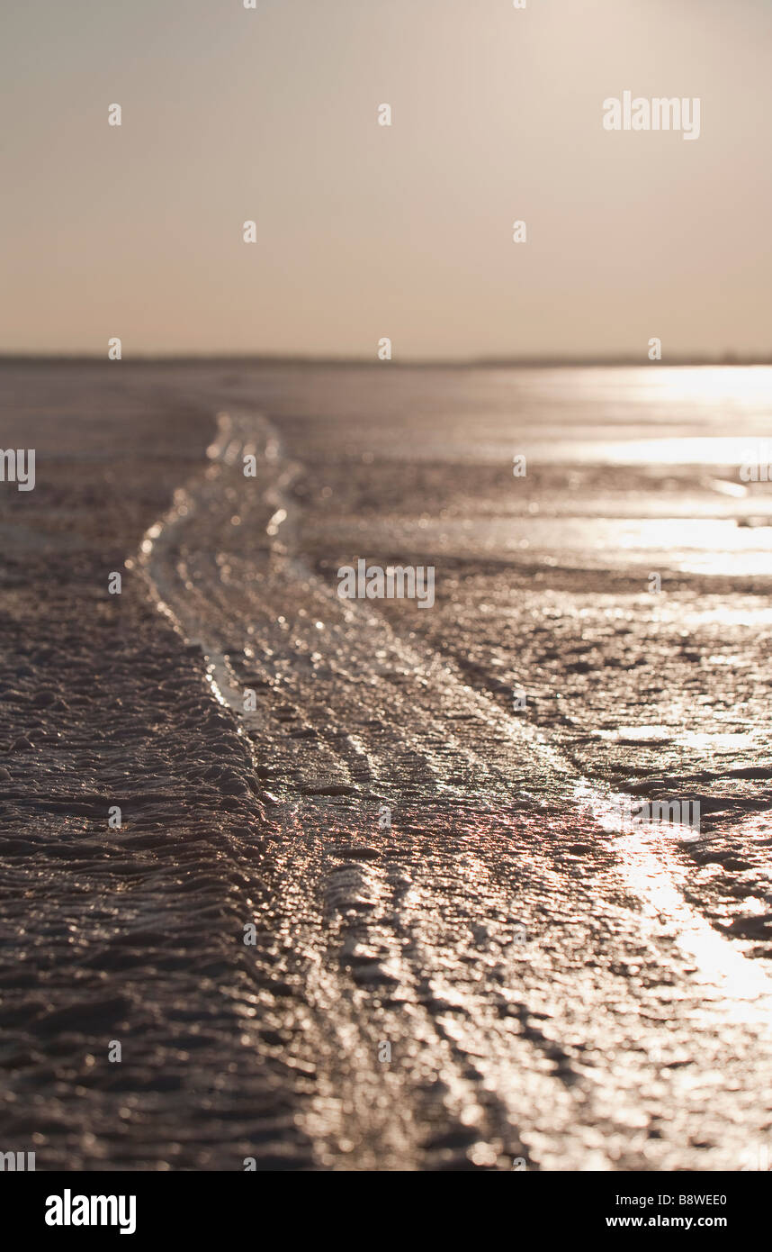 Frozen snowmobile track on sea ice , Finland Stock Photo - Alamy