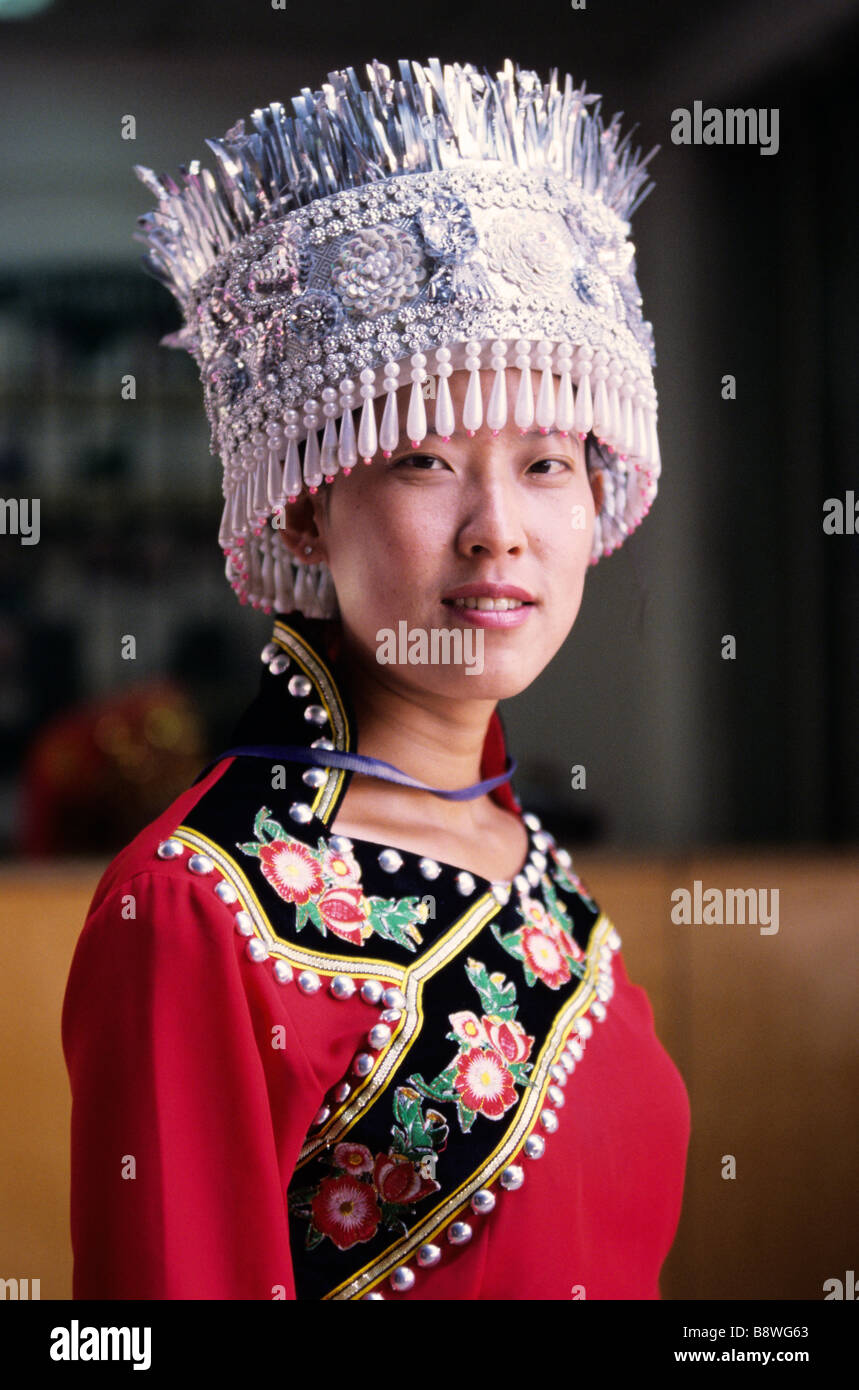 Asia, China, Yunnan Province. Young Miao Hmong minority woman in ...