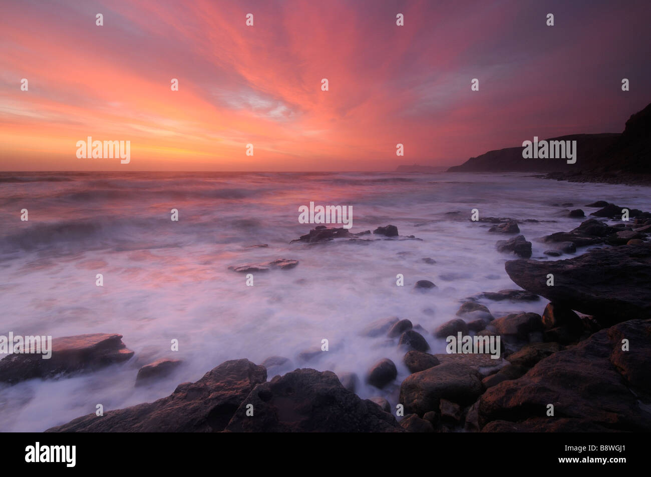 A red dawn at Burniston near Scarborough on the east coast of Yorkshire ...