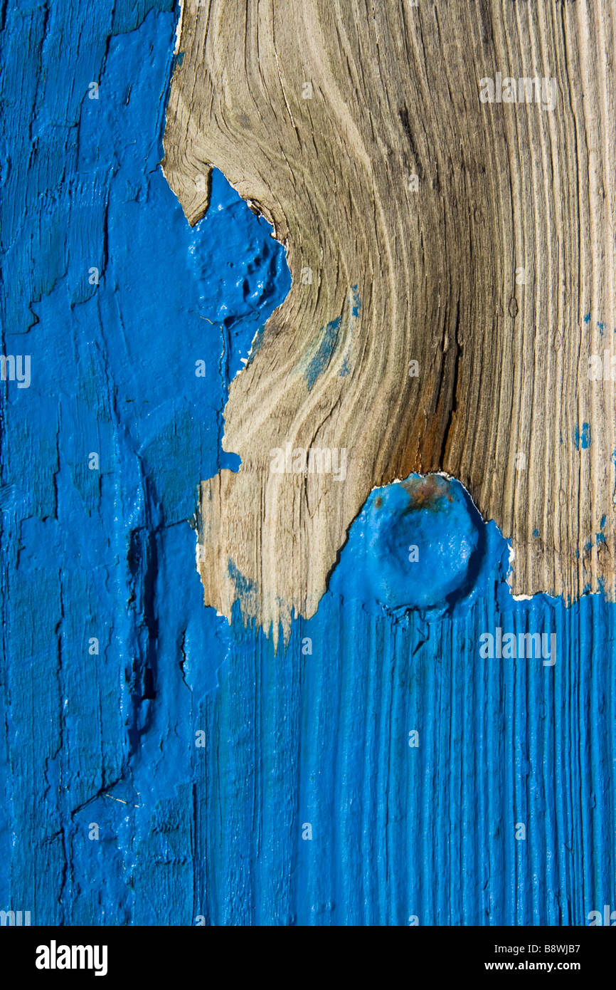 Peeling blue paint on a bench Stock Photo - Alamy
