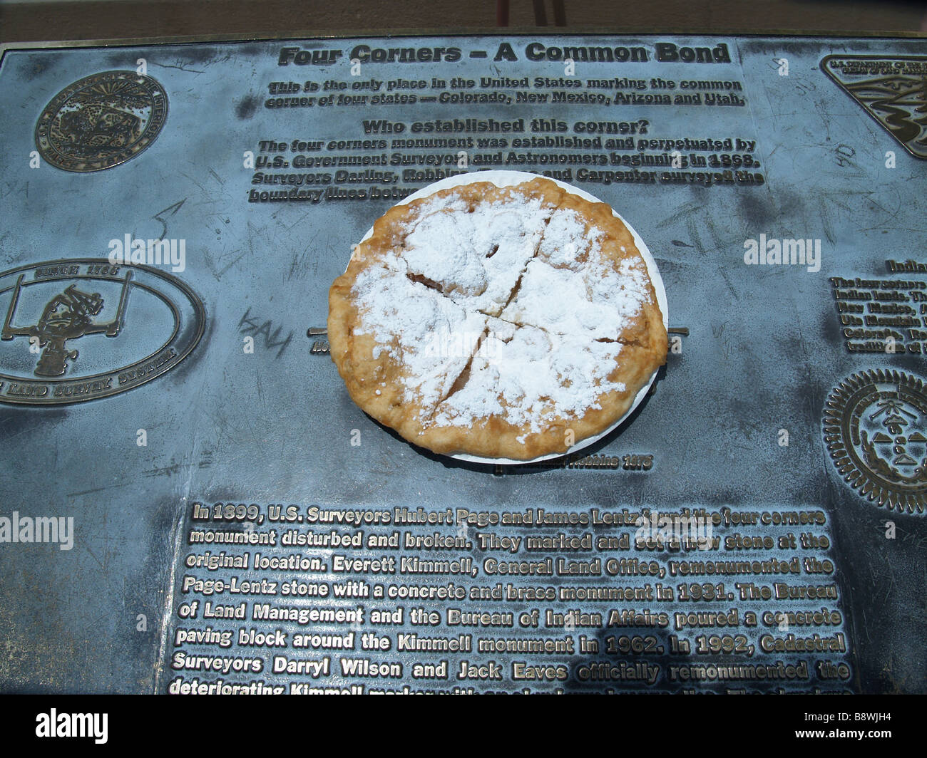A piece of Native American Fry Bread sits on the descriptive plaque at ...