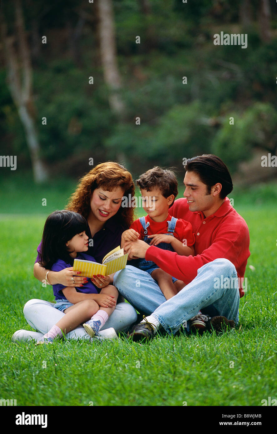 Hispanic Family Reading Together