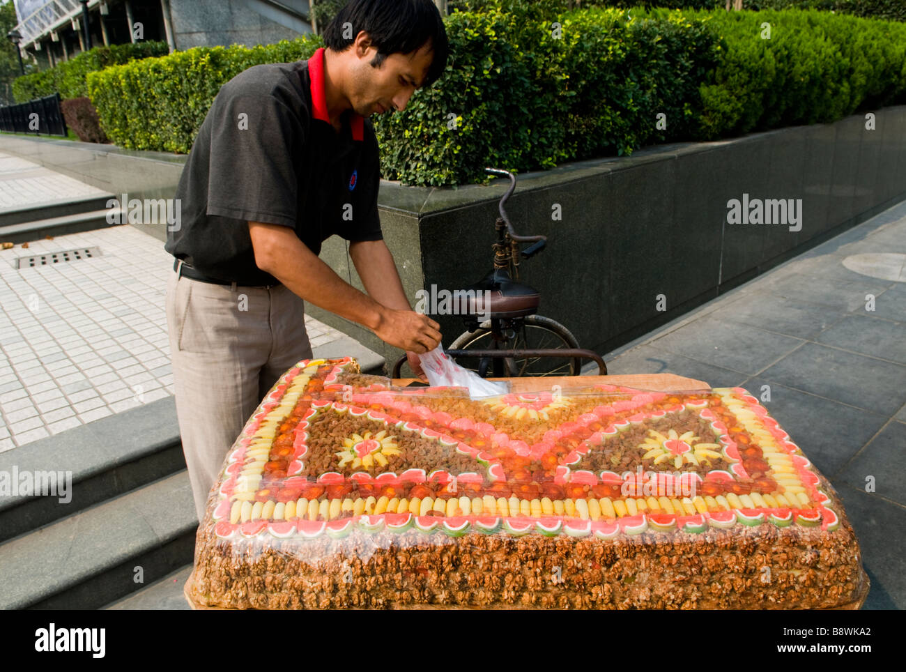 Uygur sweets sold in the streets of Shanghai Stock Photo - Alamy