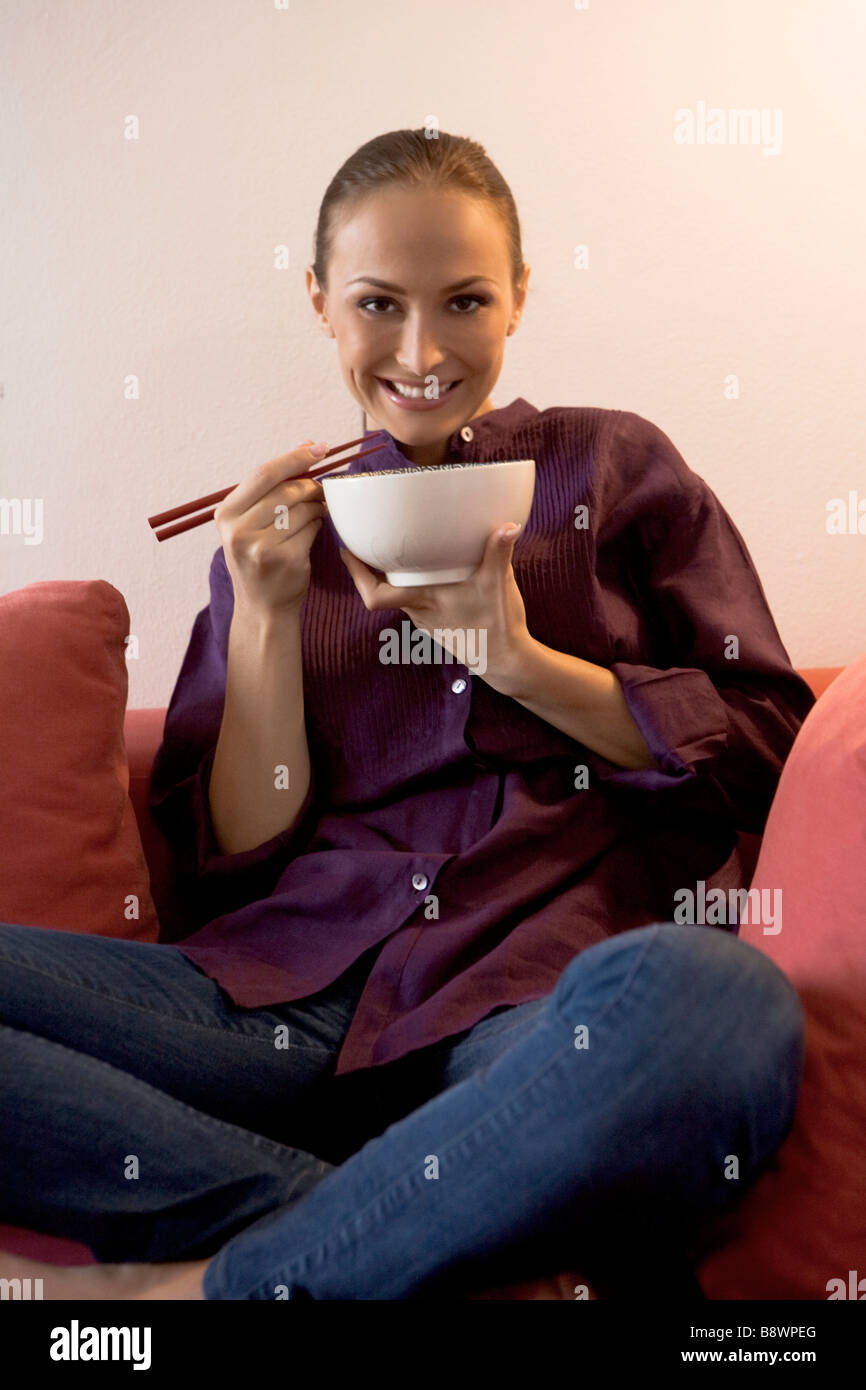 woman eating chinese food Stock Photo - Alamy