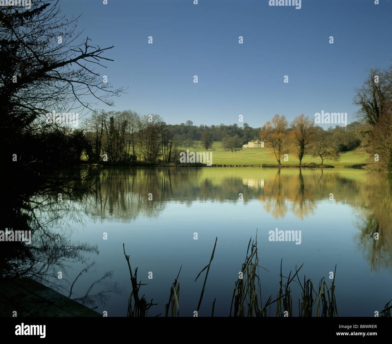 A view across the lake in Dinton Park to Philipps House an early C19th ...