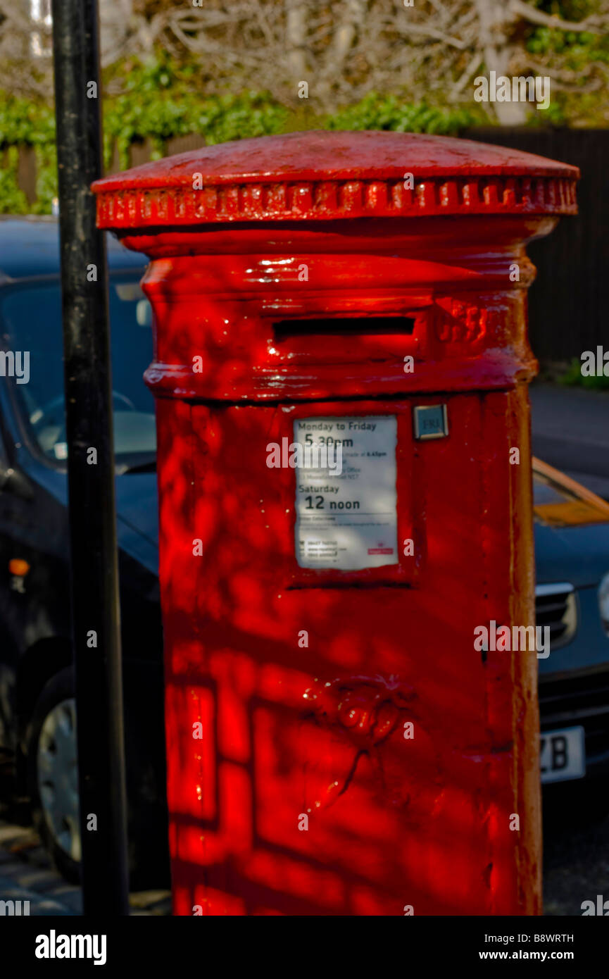Freshly repainted red Queen Elizabeth 2nd post office pillar box on a ...