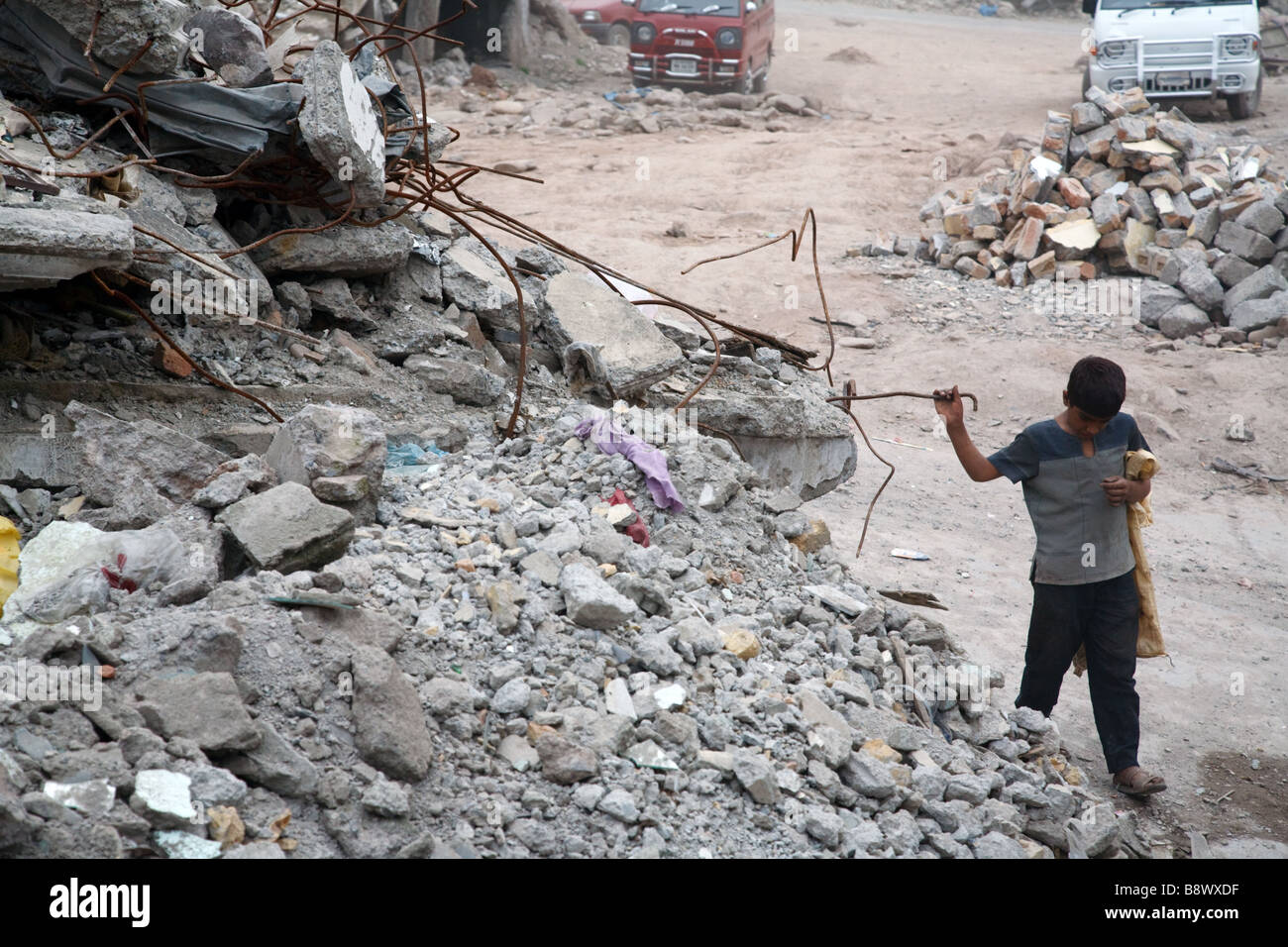 Ruins of buildings in a street in central Muzaffarabad, Pakistan ...
