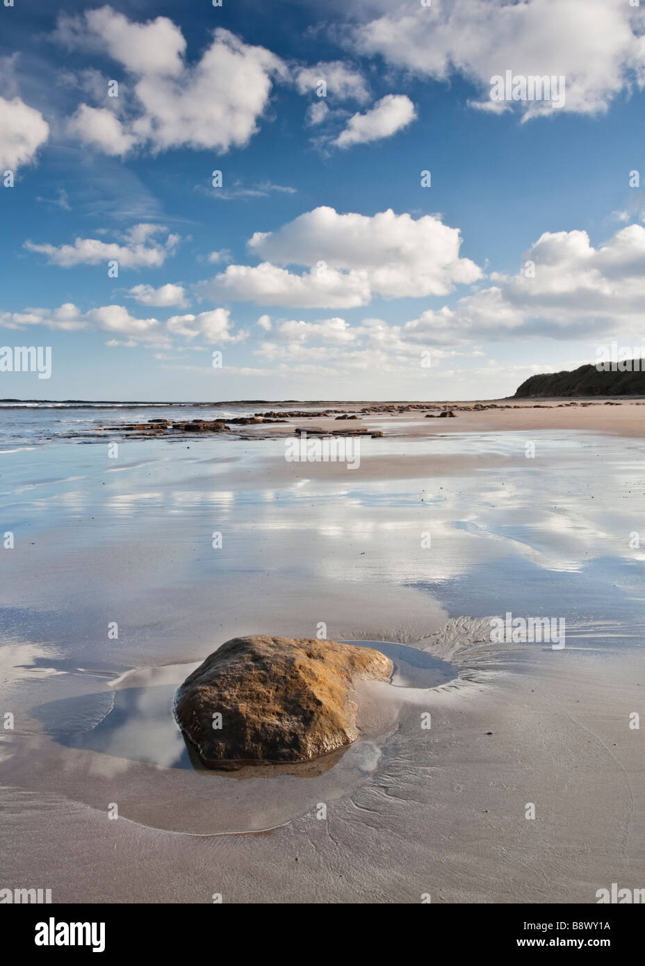 Sunny spring afternoon on a deserted beach between Low Hauxley and the ...