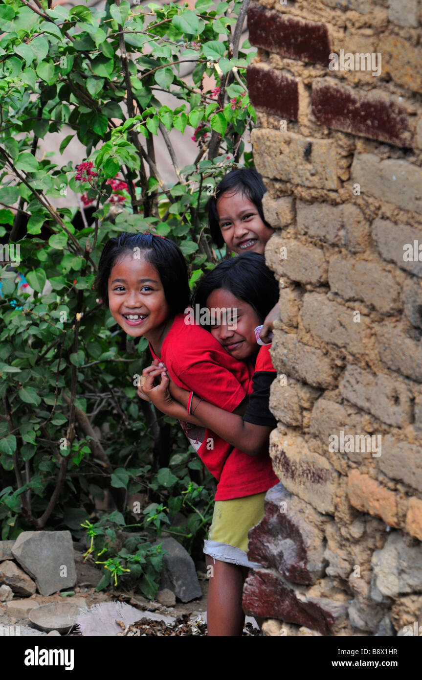 Bali Aga girls having fun with hid and seek game,Julah village,Bali ...
