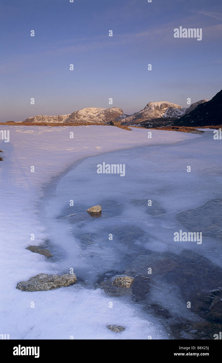 Three Tarns covered with ice and snow near Bow Fell in the Lake ...