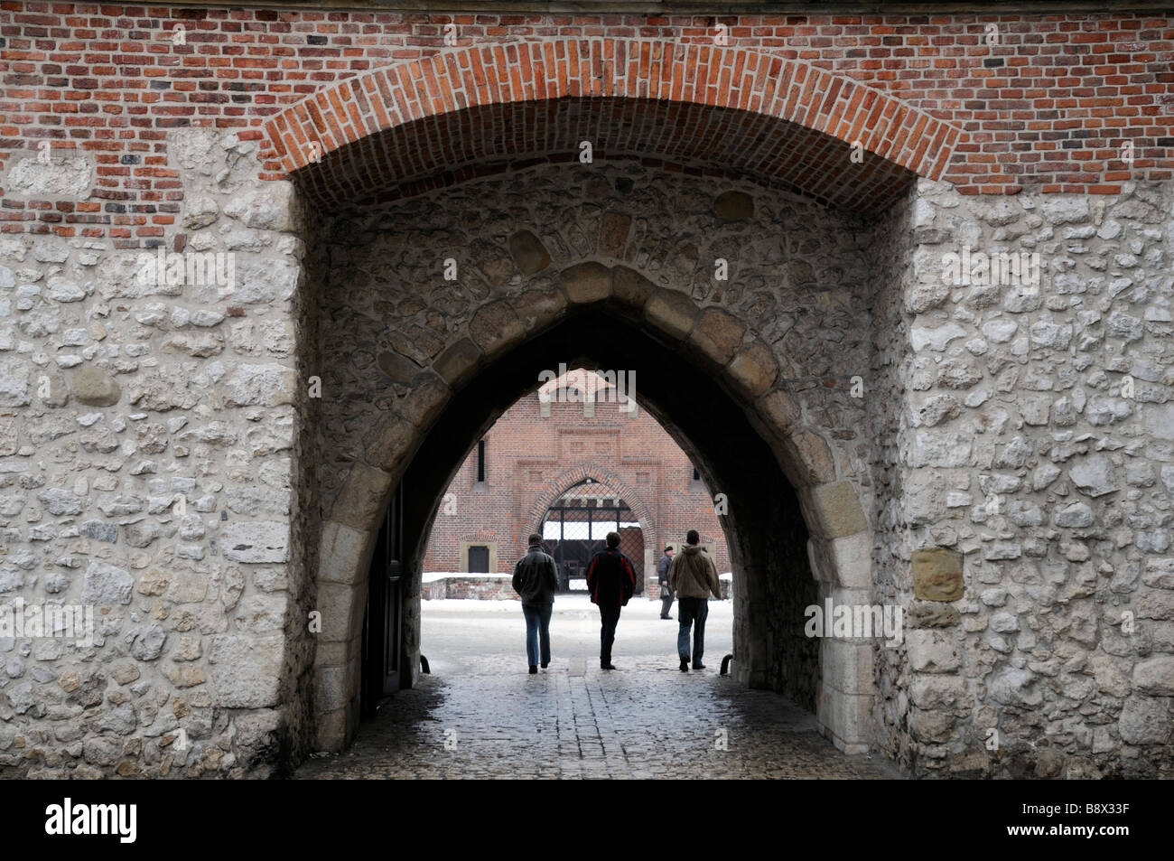 people walking through the Florianska Gate Brama Florianska defence ...