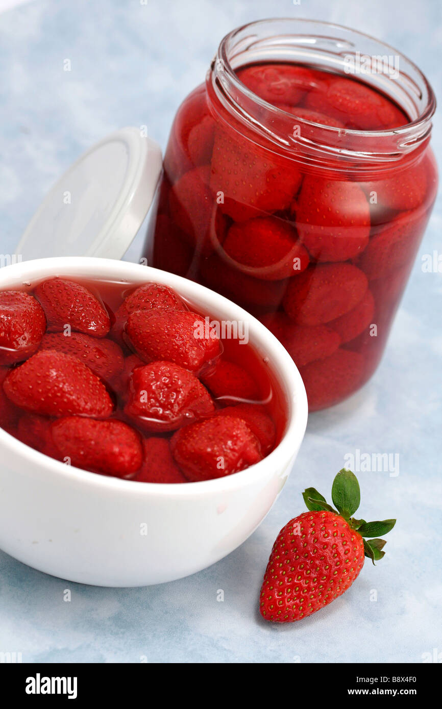 Strawberries in syrup Stock Photo - Alamy