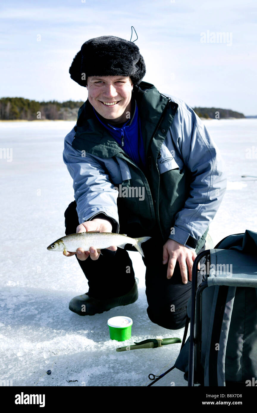 Ice Fishing in spring For editorial use only Stock Photo - Alamy