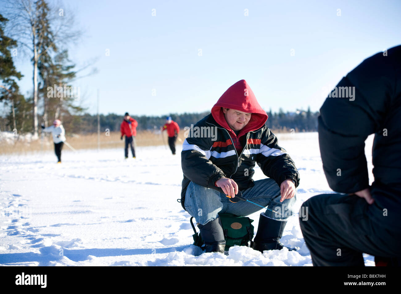 Ice Fishing For editorial use only Stock Photo - Alamy