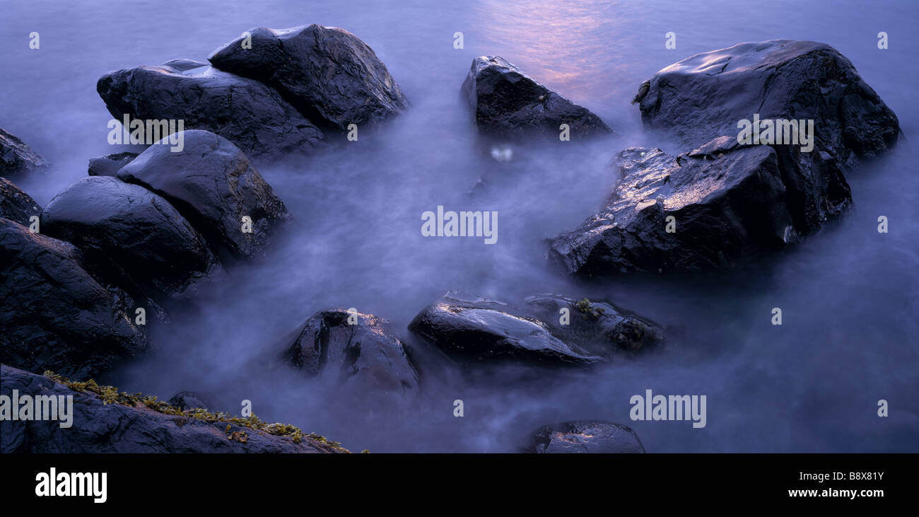 A circle of rocks in the sea at Drumnakill Point Fair Head County ...
