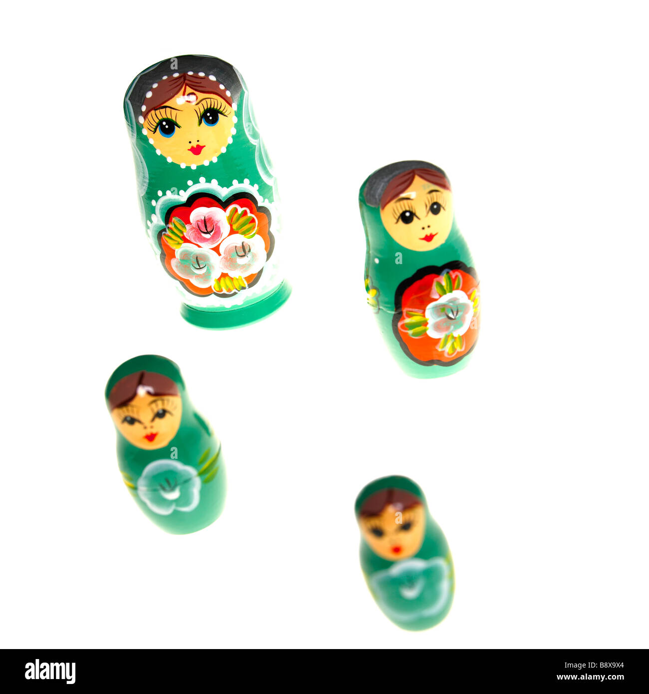 A line of russian dolls on a white background Stock Photo - Alamy