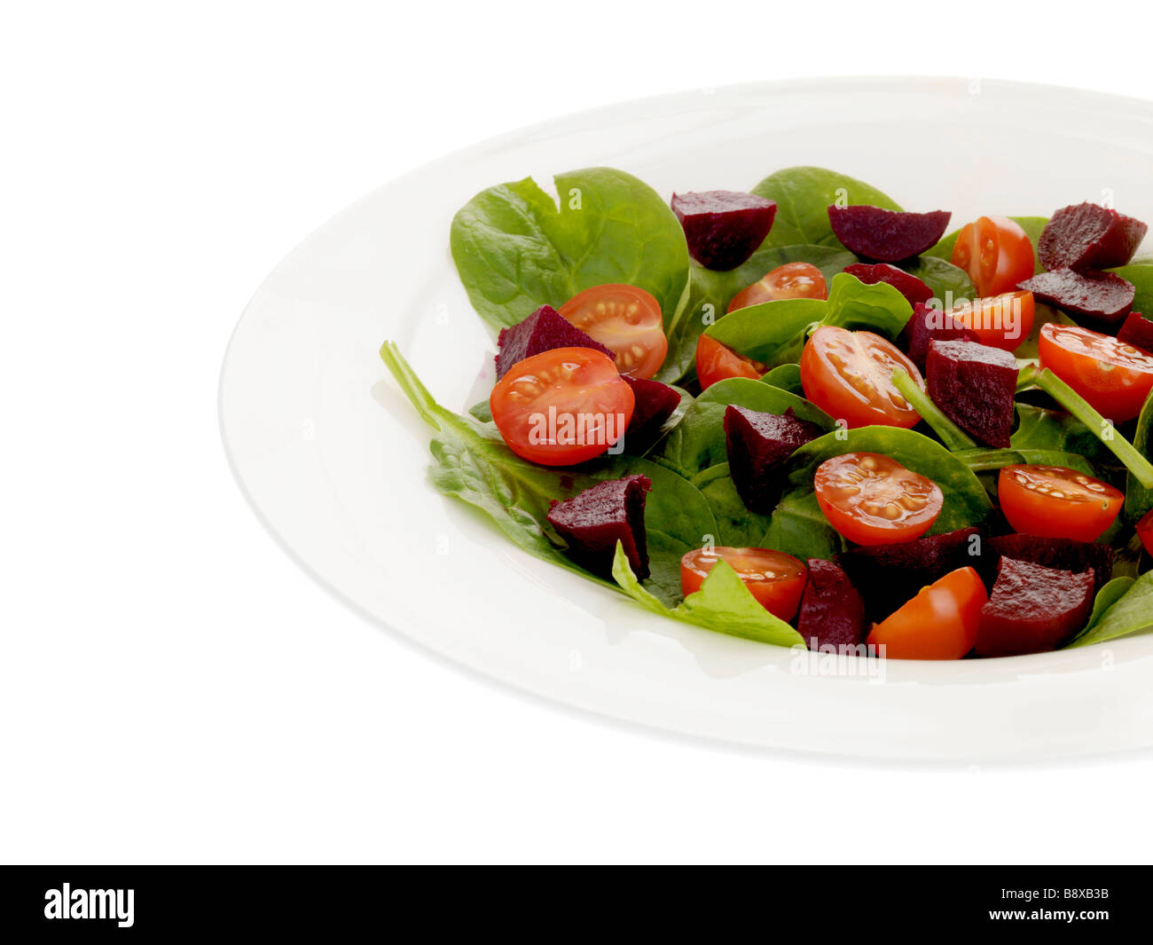Spinach leaves salad Cut Out Stock Images & Pictures - Alamy