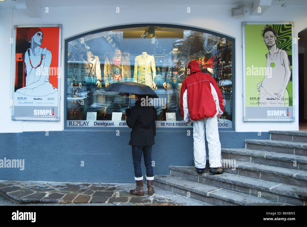people looking at shop window of fashion store Mayrhofen Austria Europe ...