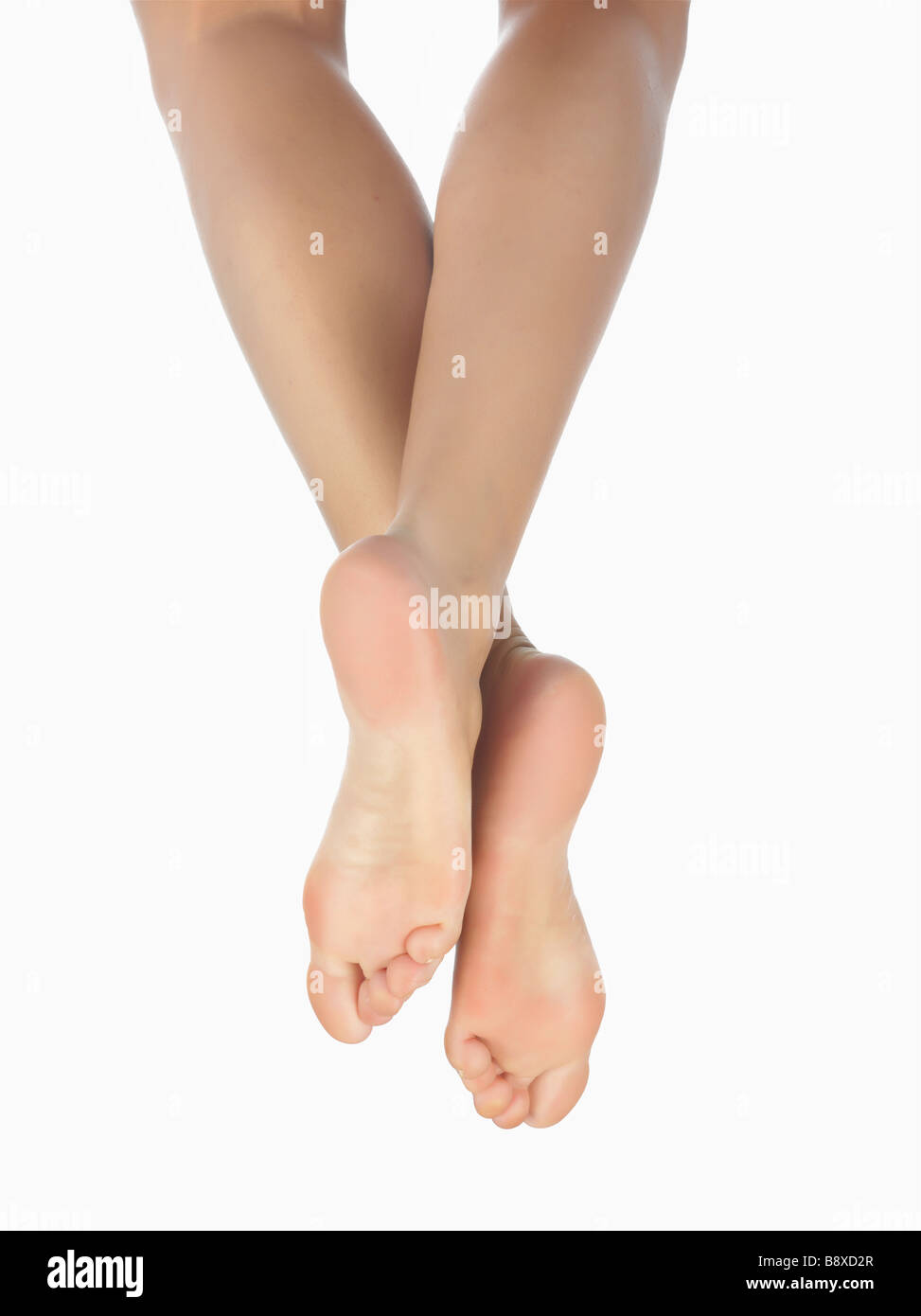 Smooth and beautiful female legs Stock Photo - Alamy