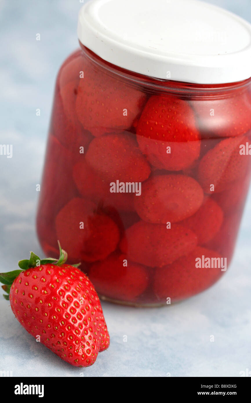 Strawberries in syrup Stock Photo - Alamy