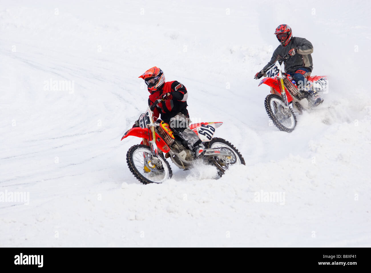 Winter races of motorcyclists It is photographed on a white background ...