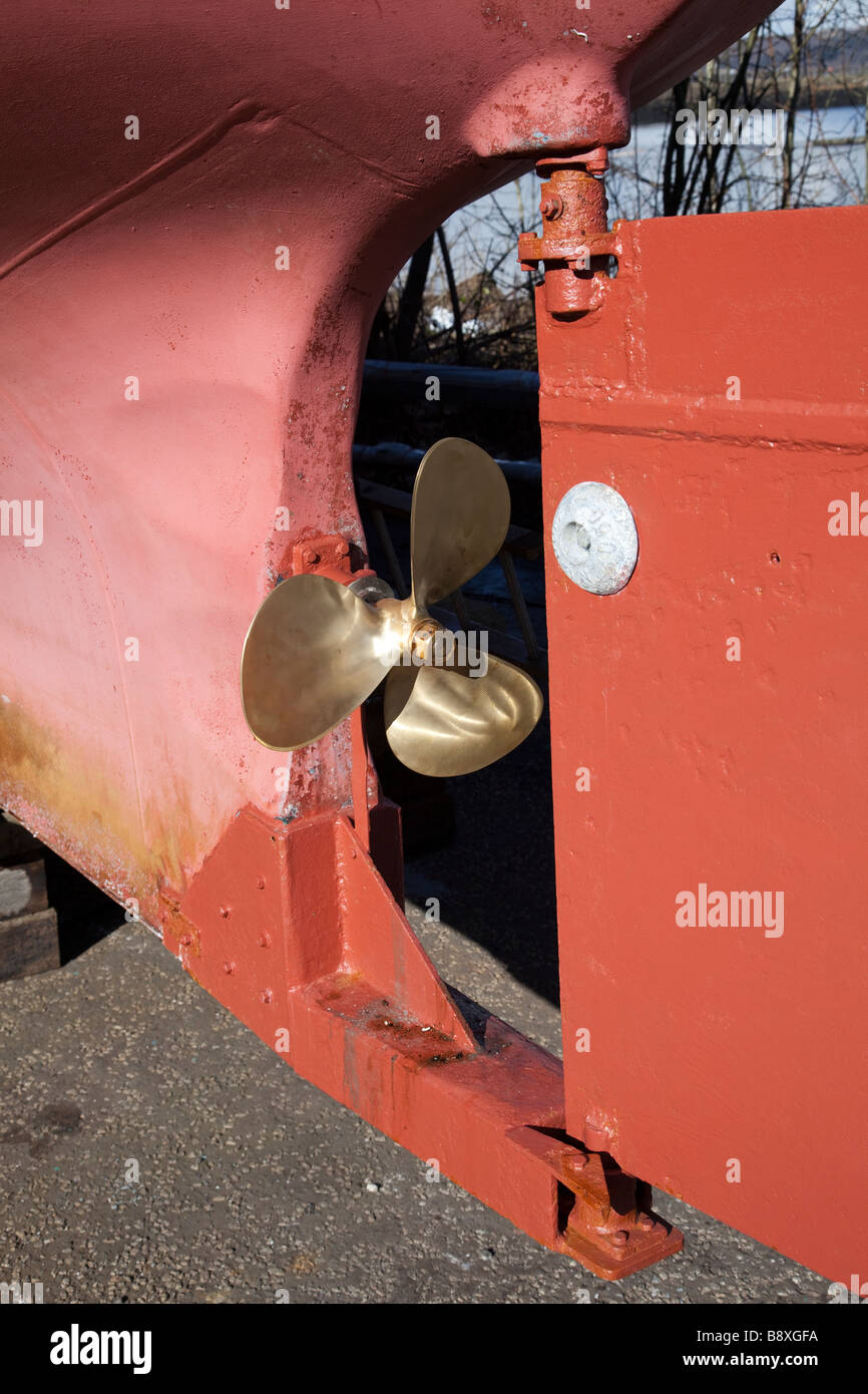 Brass boat propeller with keel and rudder Stock Photo - Alamy