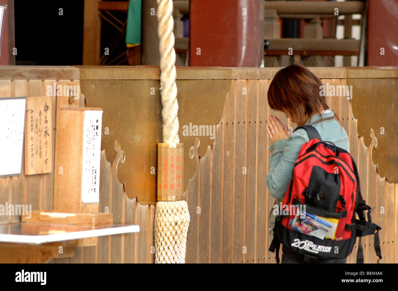 Japanese Girl Praying at a Shrine Kyoto Japan Stock Photo - Alamy