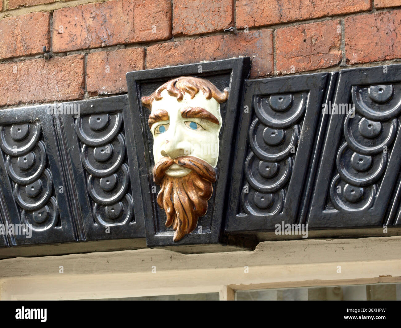 A decorative window lintel at Ashbourne,Derbyshire Stock Photo - Alamy