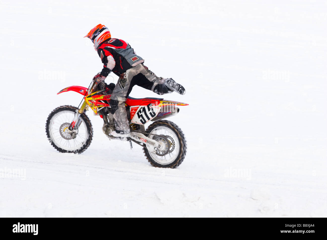 Winter races of motorcyclists It is photographed on a white background ...