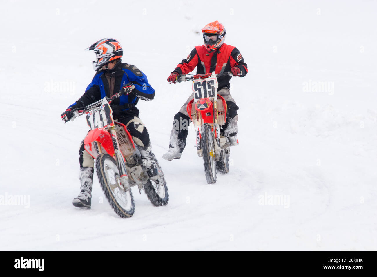Winter races of motorcyclists It is photographed on a white background ...