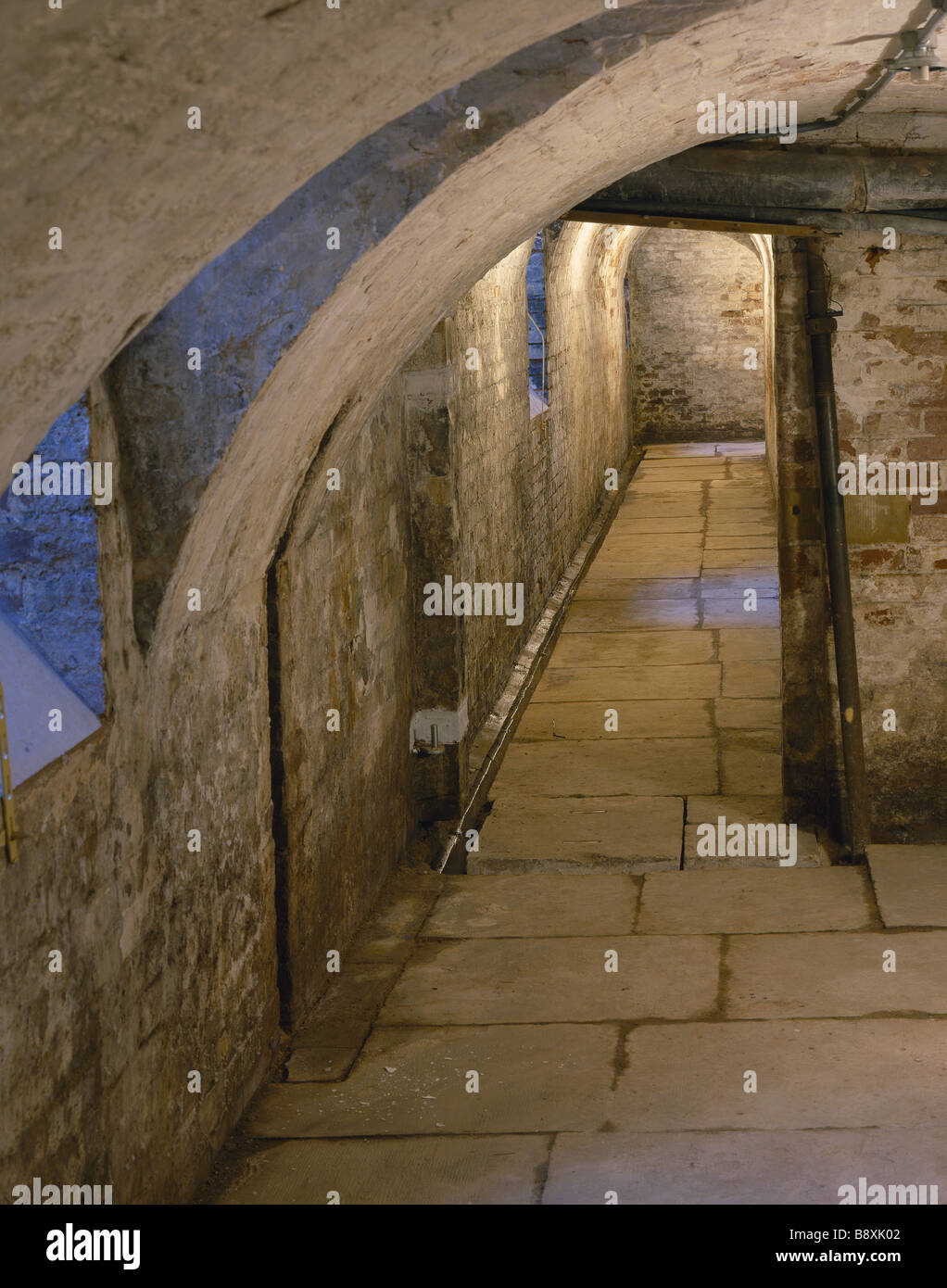 The Cellar Corridor View along the corridor showing brickwork and stone ...