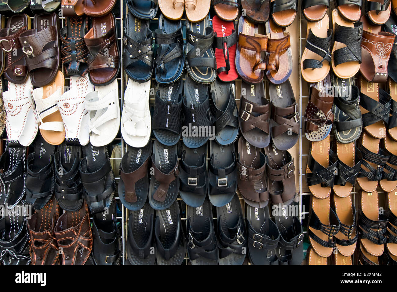 Seller of slippers Deira Dubai United Arab Emirates Stock Photo - Alamy