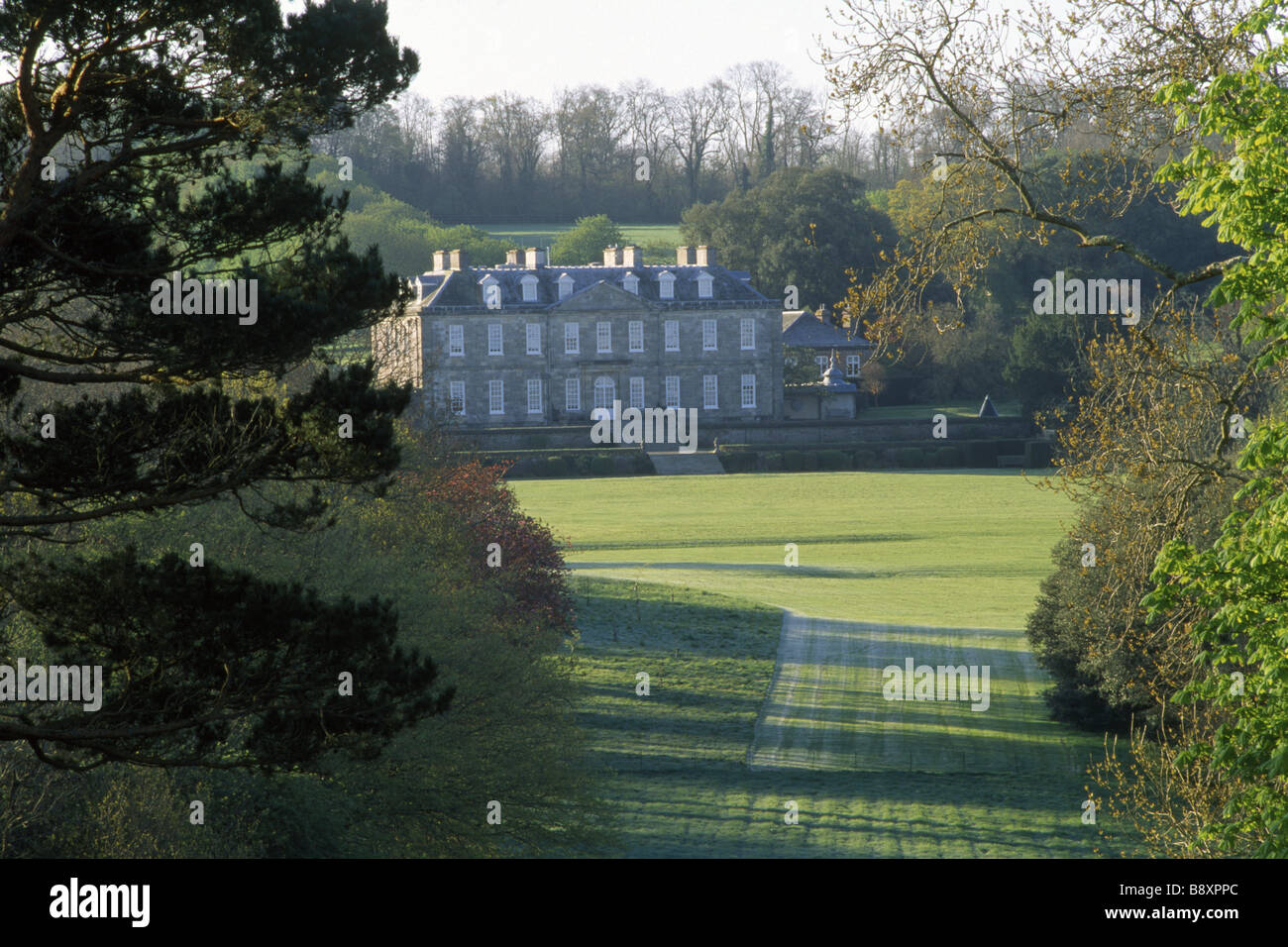 A distant view of the north front of Antony House seen across the lawn ...