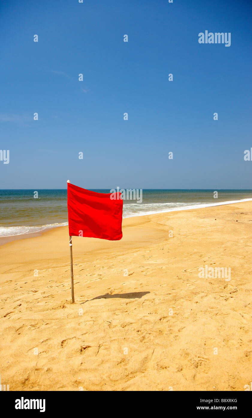 Red Danger Flag at Calndolim Beach Goa India Stock Photo - Alamy