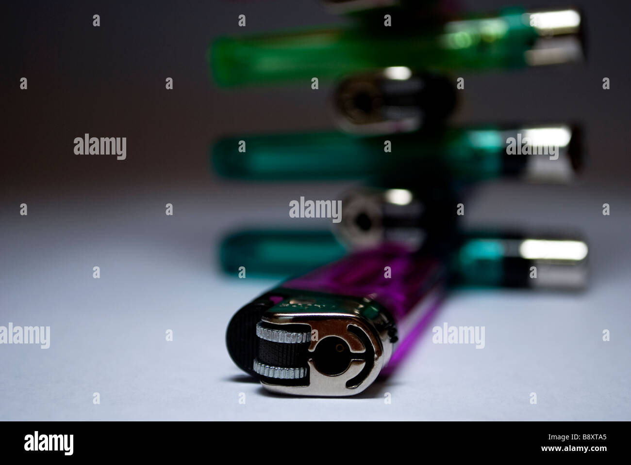 Stacked lighters 2 Stock Photo - Alamy
