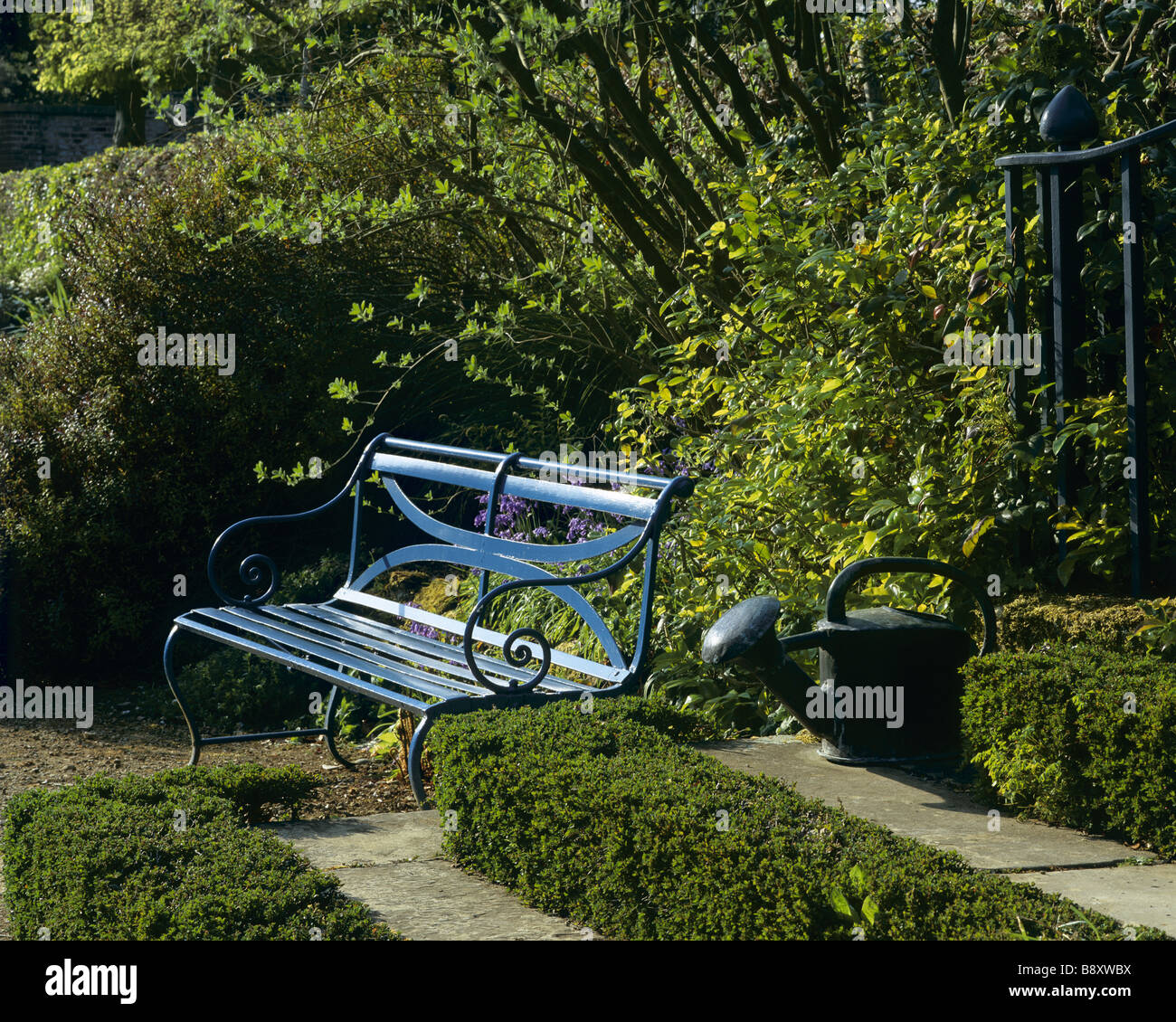 Blue bench at the top of the Long Walk at Hidcote Manor Garden A ...