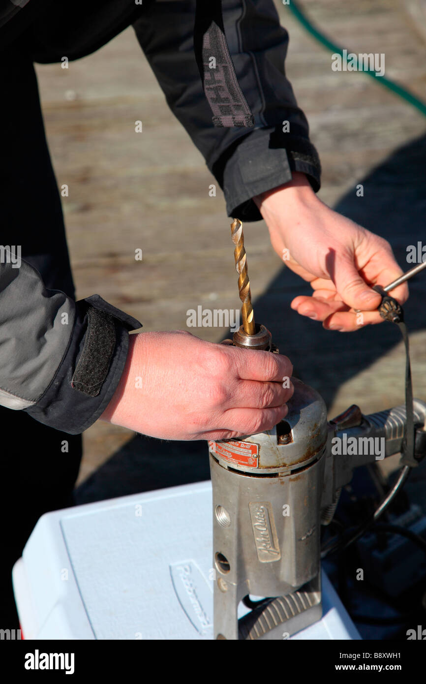 man with drill Stock Photo - Alamy