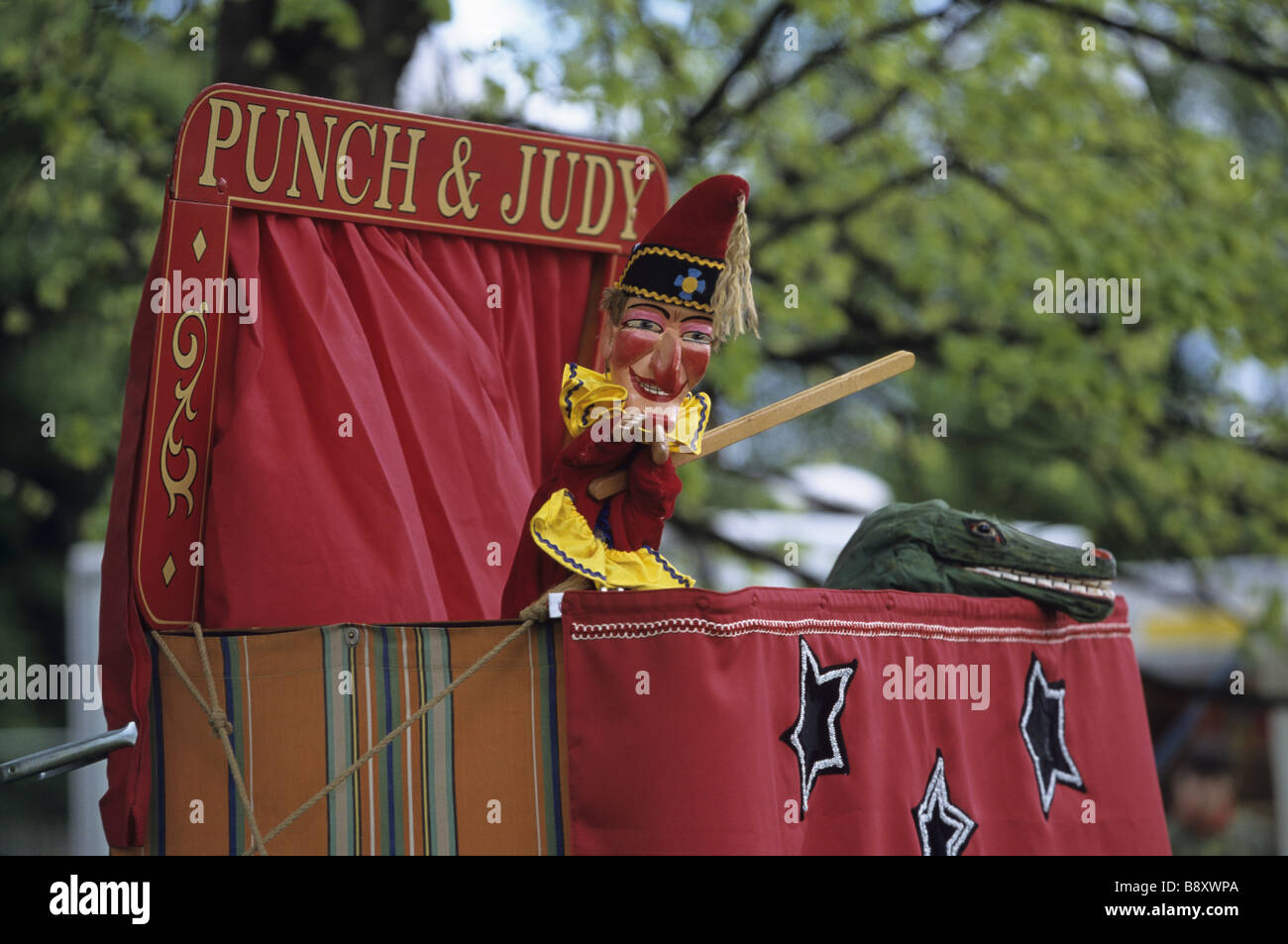 Punch the puppet in traditional costume on stage at the Morden Hall ...