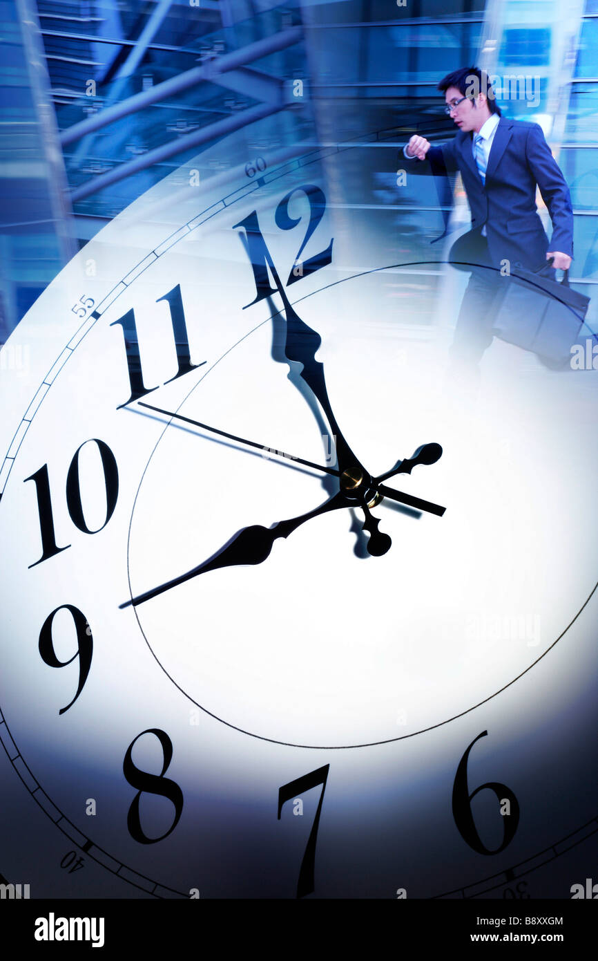 Man looking at the watch and hurrying to work Stock Photo - Alamy