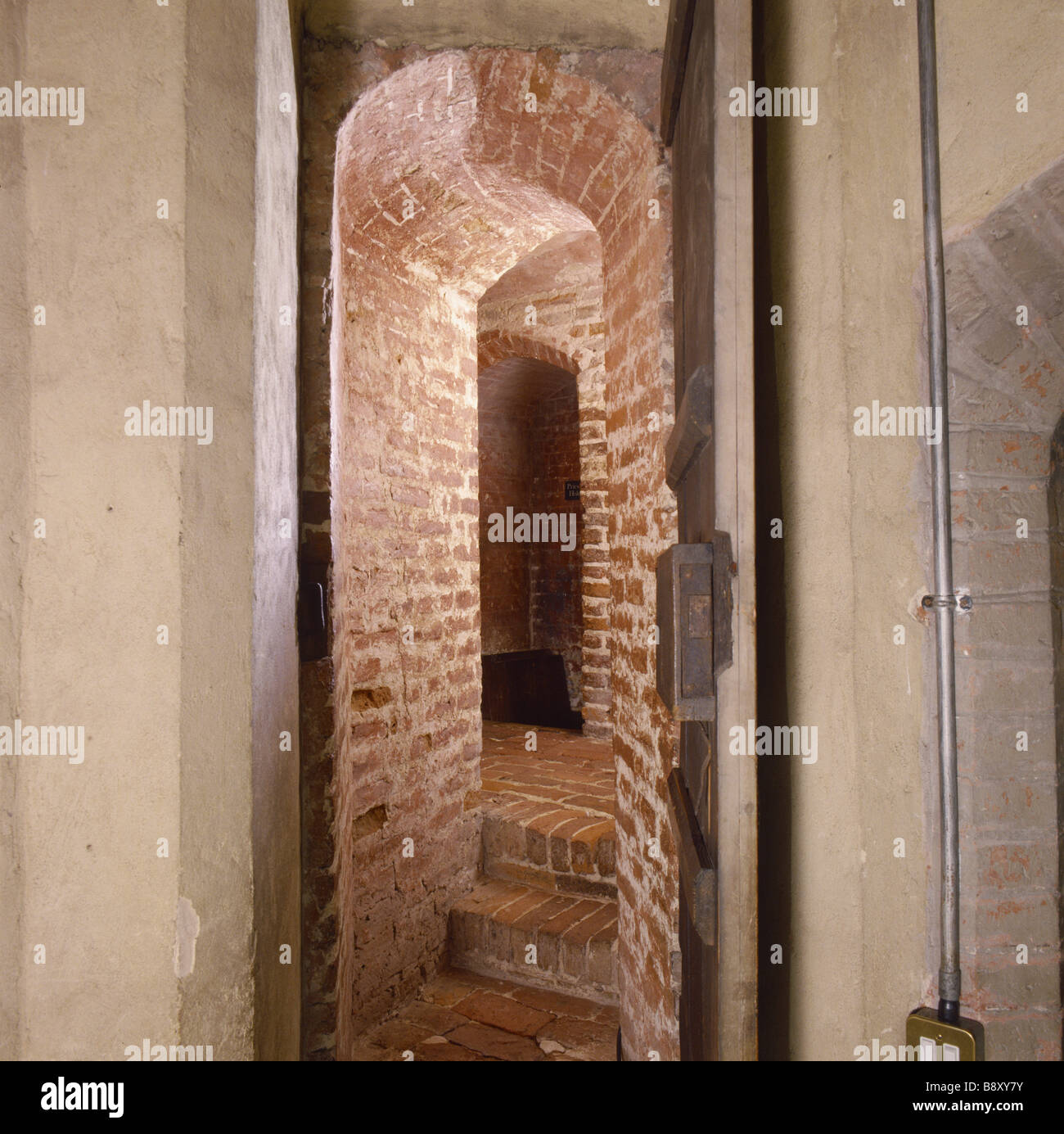 The Priest s Hole at Oxburgh Hall showing the doorway open Stock Photo ...