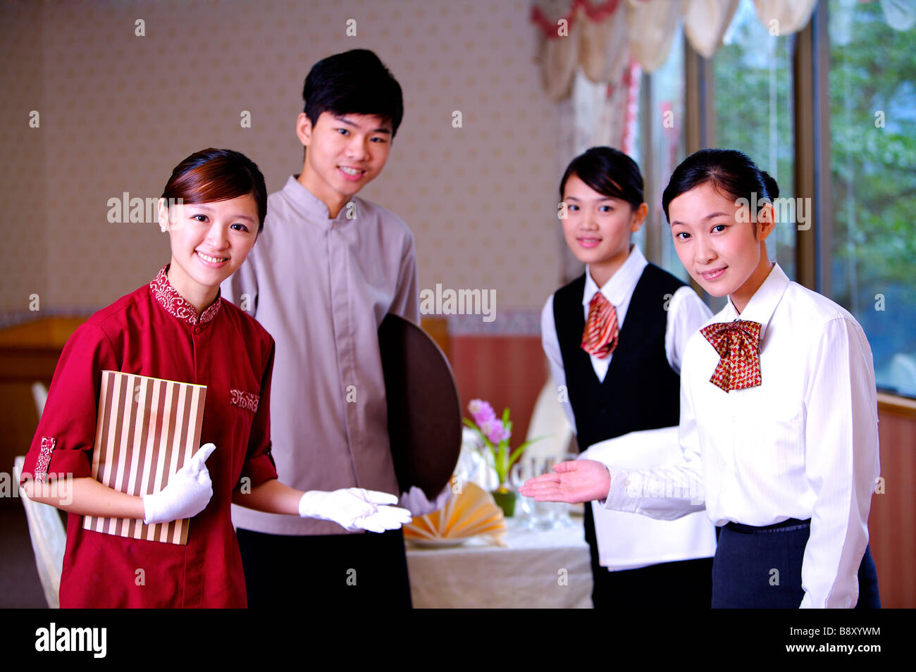 Chinese waitresses hi-res stock photography and images - Alamy