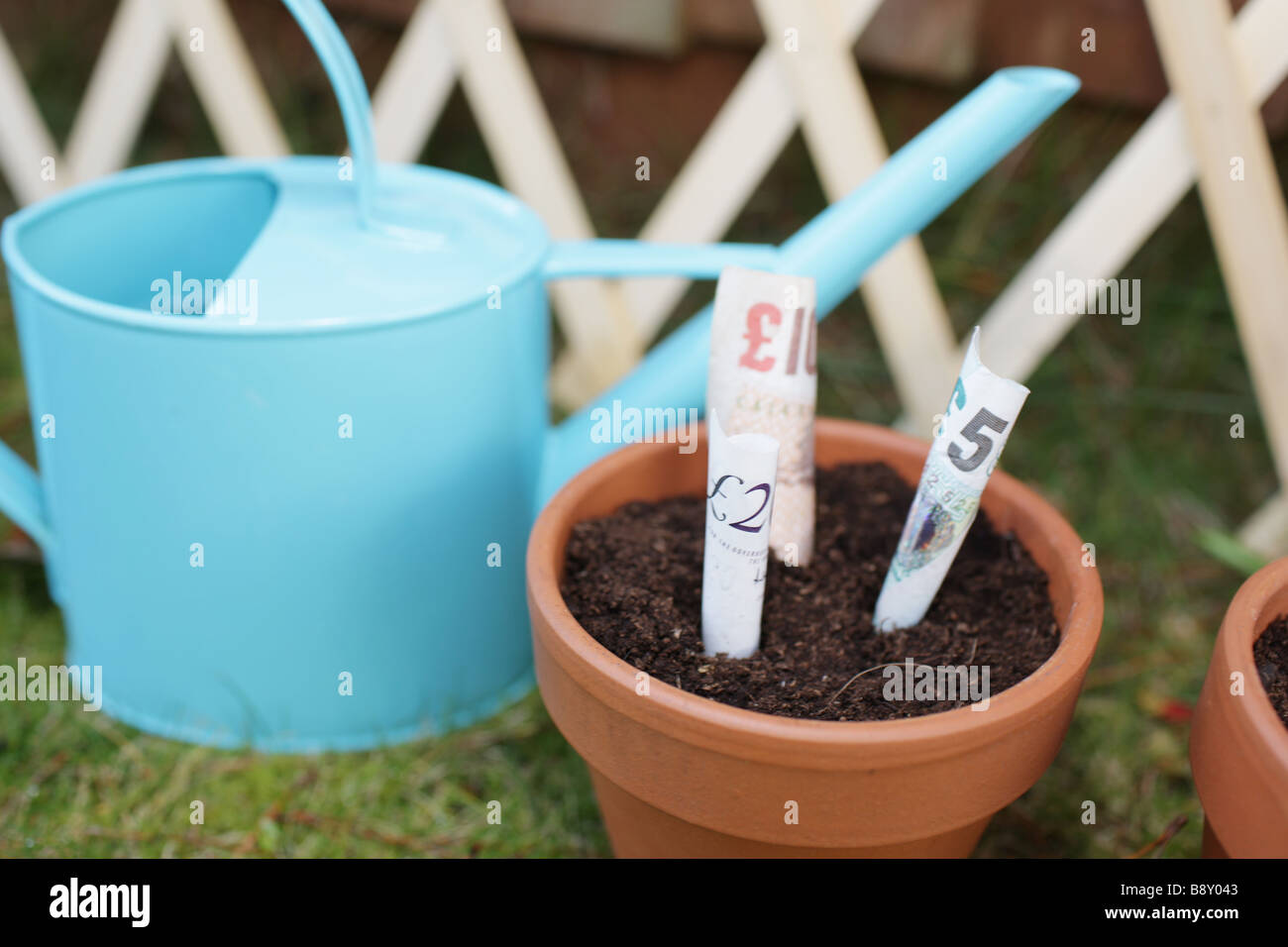 Money in a Pot Stock Photo - Alamy