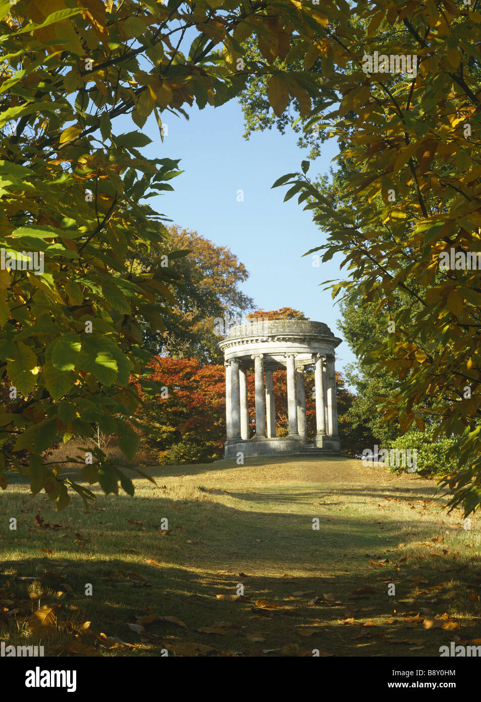 The Rotunda in the grounds at Petworth, seen through a frame of sweet ...